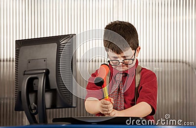 Nerdy Boy Smashing His Computer Royalty Free Stock Photo - Image: 8631475