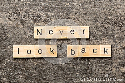 Never Look Back Word Written On Wood Block. Never Look Back Text On ...