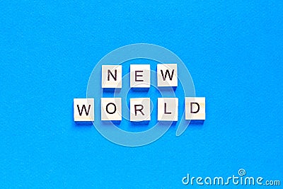 NEW WORLD Word On Wooden Alphabet Cube. New Normal Concept. Top View ...