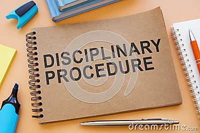 Notebook About Disciplinary Procedure With Papers On The Table. Royalty ...