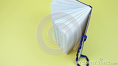 An Open Notebook with Top View on a Yellow Background Stock Video ...
