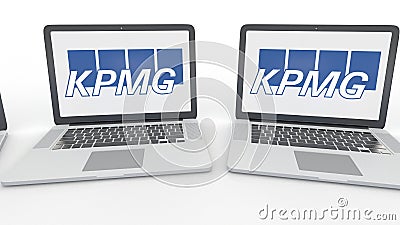 Notebooks with KPMG Logo on the Screen. Computer Technology Conceptual ...