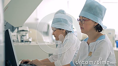 Nurses Work in a Laboratory, Using Computers and Other Medical ...