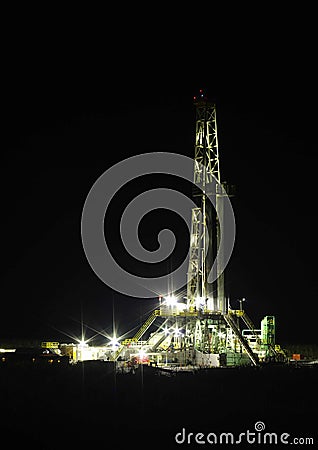 Oil Drilling Rig At Night Stock Photo - Image: 11700010