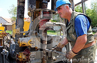 Oil Worker Drilling For Oil On Rig Stock Images - Image: 26617834