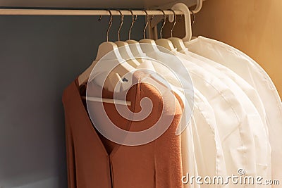 Old Clothes In A Closet On Hangers. Old-fashioned Things In The ...