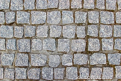 An Old Stoneblock Pavement Cobbled With Square Granite Blocks Royalty ...