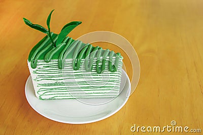 One Piece Of Green Tea Flavored Cake On White Circle Plate Stock Image ...