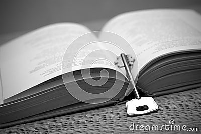 An Open Book And A Key In Black And White. Royalty-Free Stock ...