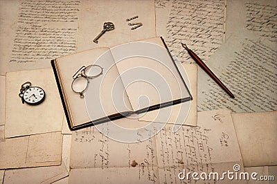 Open Book Over Old Letters And Postcards Stock Photo | CartoonDealer ...