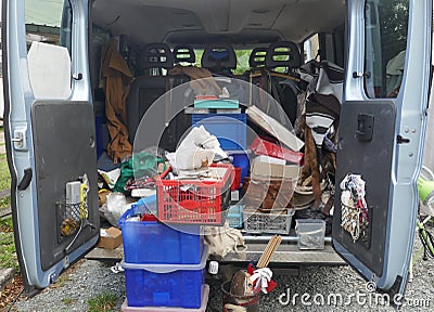 Open, Untidy Trunk Of A Delivery Van, Loaded With Old Tools, Scrap And ...