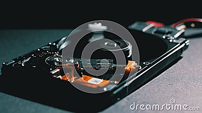 Opened Hard Disk Drive with Spinning Platter. Move of Writing Magnetic ...