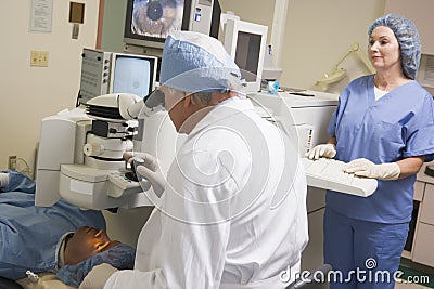 Opthamologist Performing Laser Eye Treatment Stock Photography ...