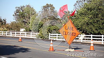 Lane Closed Sign with Orange Flags and Cones on Road Stock Footage ...