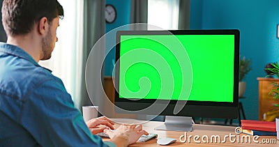 Over the Shoulder Shot of Man Typing on a Keyboard Computer with Blank ...