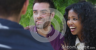 Over the Shoulder Shot of Multi Ethnic Group of Friends Laughing ...