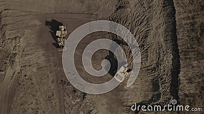 Overhead View of Tractor and Excavator Doing Earthwork at Construction ...