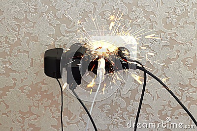Overloaded Socket Spark. Danger Of Electric Shock Fire. Wire Plug Fire ...