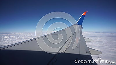 An Overview of the Plane S Wing Above the Clouds at the Window - Wide ...