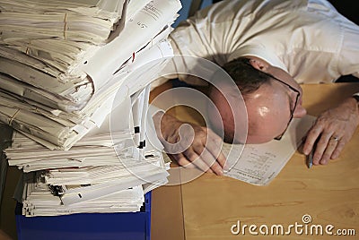 Overwhelmed By Paperwork Royalty Free Stock Image - Image: 1689616