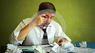 Overworked Businessman Trying Working with Documents. Stock Footage ...