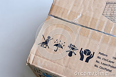 Packaging Symbol On A Brown Cardboard Parcel Box, Do Not Sit On The Box ...