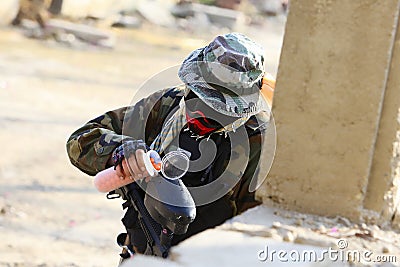 Paintball Player Reloading A Rifle Royalty-Free Stock Image ...