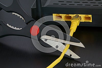 Cutting An Ethernet Cable Connected To An Internet Modem With Scissors ...