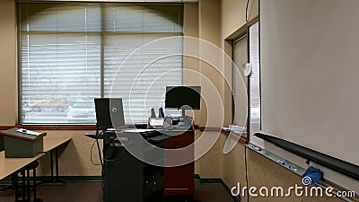 Pan Left of Classroom Computers and Technology in Front of Room Stock ...