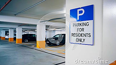 Parking Area With Sign Indicating Residents Only, Modern Underground ...