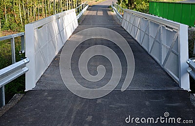 Path For Cyclists With An Asphalt Surface. Galvanized Iron Railing Over ...