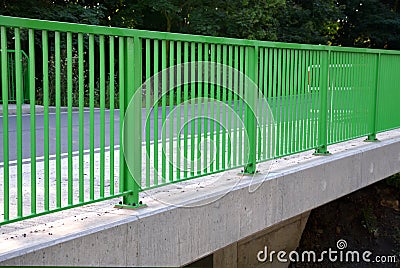 Path For Cyclists With An Asphalt Surface. Galvanized Iron Railing Over ...