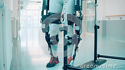 Patient with Disability is Moving in the Exoskeleton Stock Video ...