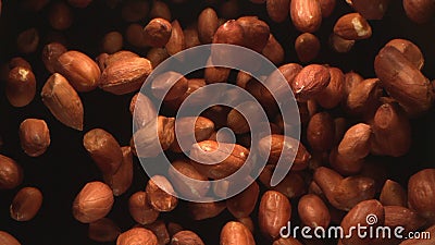Peanuts Nuts Flying in the Air in a Free Fall in Slow Motion on Black ...
