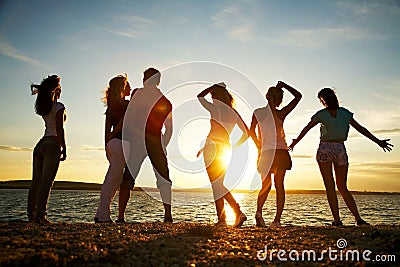 People On The Beach Sunset Stock Image - Image: 16243461