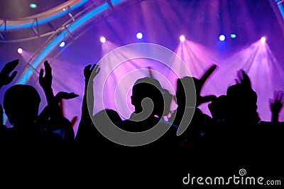 Photo of People Having Fun at Rock Concert, Fans Applauding To Famous ...