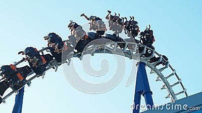 Rollercoaster Upside Down Close-up in an Amusement Park, Slow Motion ...