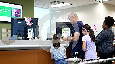 People at Service Counter Talking To the Bank Teller Stock Video ...