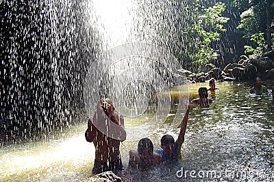 People Under Waterfall Royalty Free Stock Photos - Image: 62358