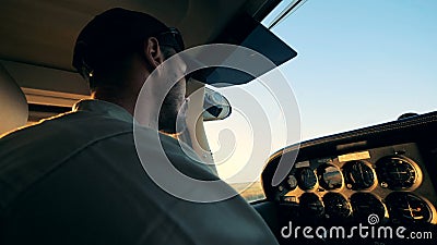 A Pilot Sitting in a Cockpit while Flying, Close Up. Stock Footage ...