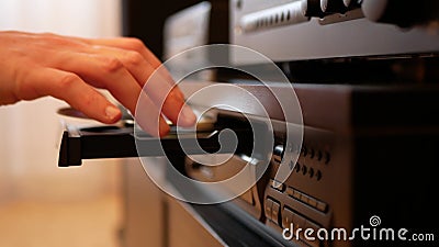 Person is Pressing a Button To Open the Disc Tray, Inserting the CD ...