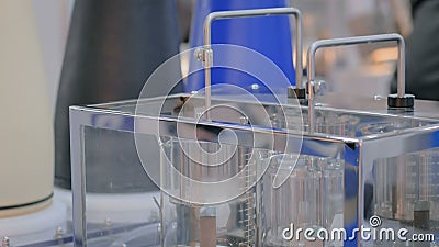 Automatic Tablet Disintegration and Dissolution Apparatus Stock Footage ...