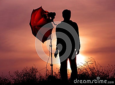 Photographer At Dusk Stock Photo - Image: 58620
