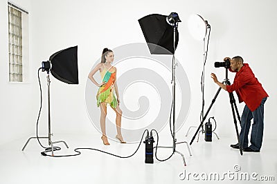 Photographer With A Model. Royalty Free Stock Photos - Image: 2044448