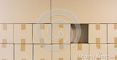 Picking a Box Out of Stack of Cardboard Boxes with Goods in a Warehouse ...