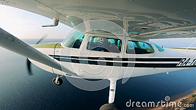 Pilot is Flying a Small Aircraft with Passengers Stock Video - Video of ...