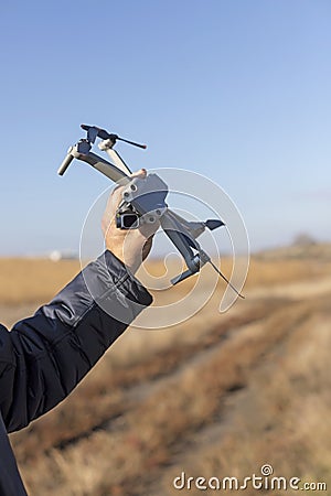 Pilot Hand Launching Drone Drone Ready To Take Off. Modern Unmanned Technologies. Delivery Of ...
