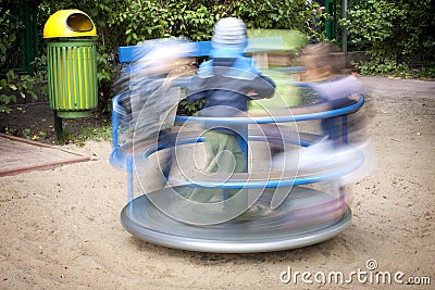 Playground with Kids and Carousel Stock Image - Image of motion ...