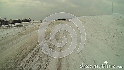 A Point of View (POV) Drive with High Snowbanks beside the Road Stock ...