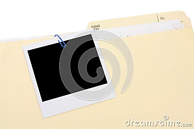 A Polaroid Photo And File Folder Royalty Free Stock Photos - Image: 1708188